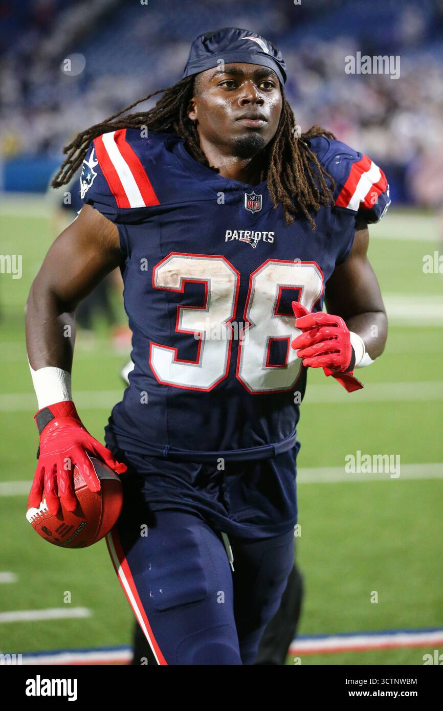 New England Patriots running back Rhamondre Stevenson (38) runs off the ...