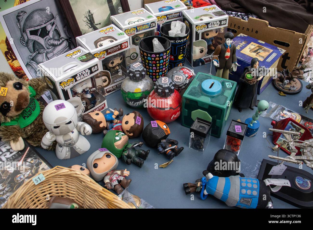 Science fiction and fantasy toys and decor for sale at a garage sale or ...