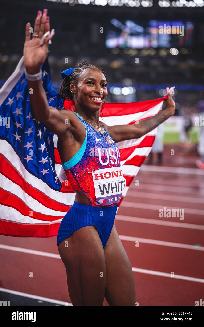 Kayla White celebrating her victory with her country's flag at the 2025 ...