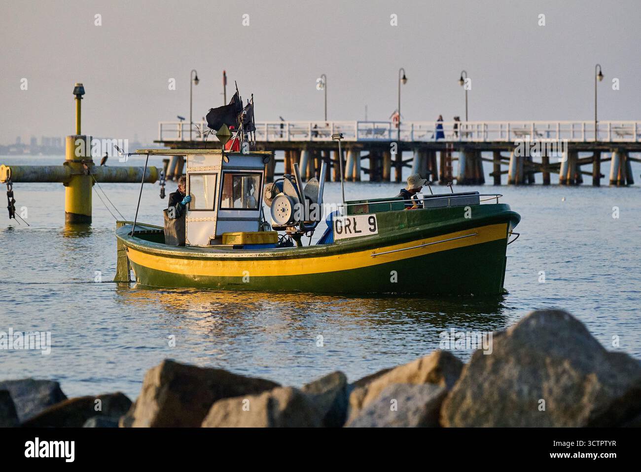 Fishing boat ORL 9 Baltic Sea morning light, Gdynia pier, Poland ...