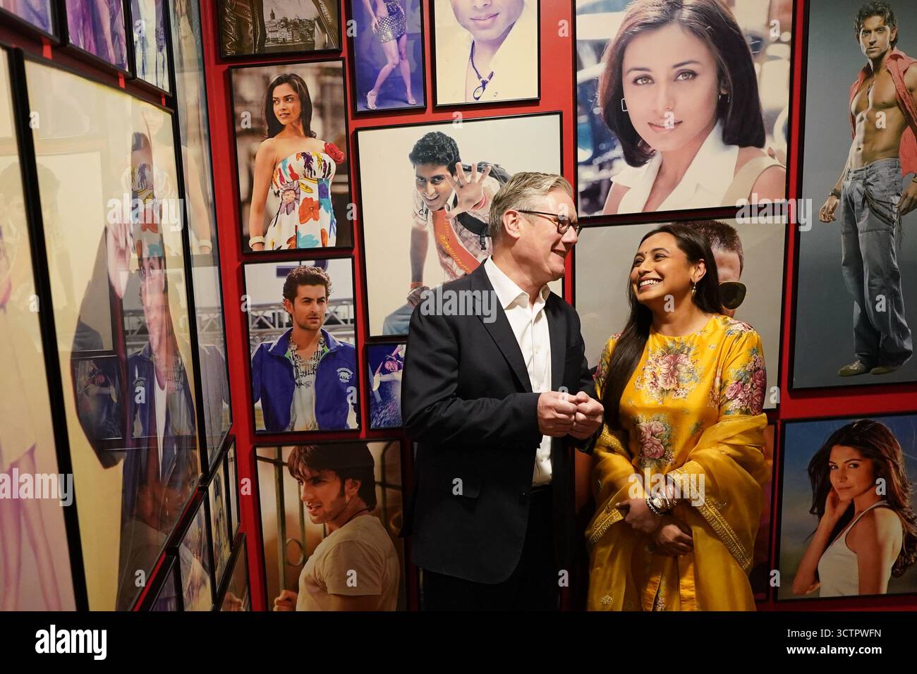 British Prime Minister Keir Starmer, left, speaks with Bollywood actress Rani Mukerji during a ...