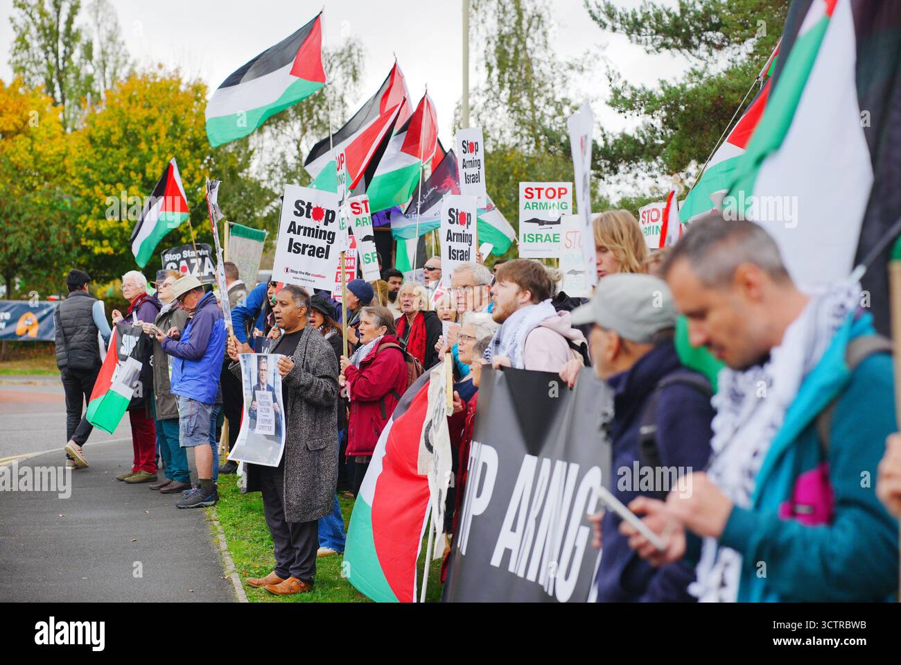 People take part in a demonstration outside the head office of Ultra ...