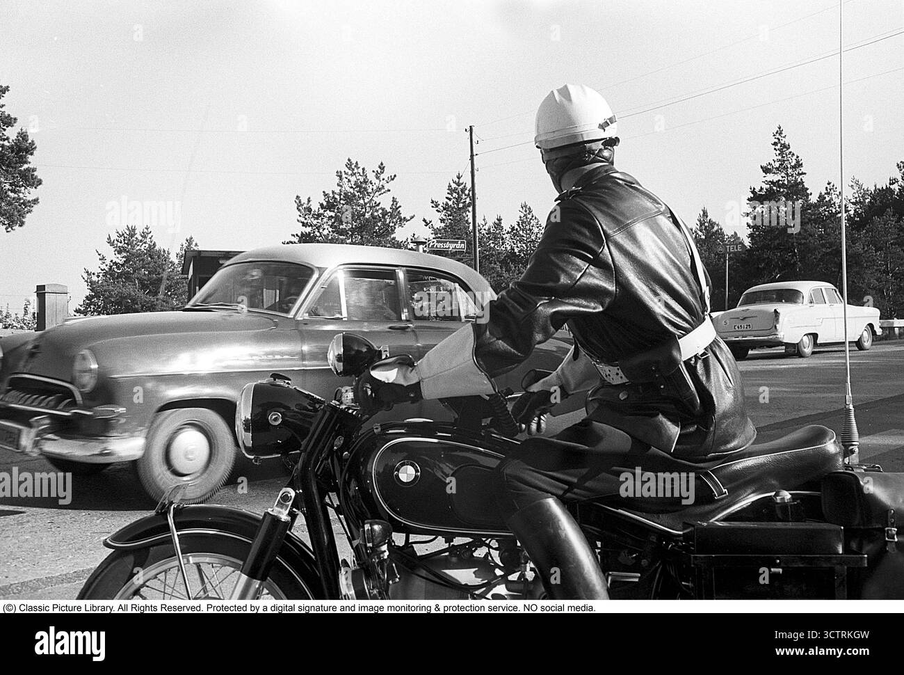 1950s police officer stands in hi-res stock photography and images - Alamy