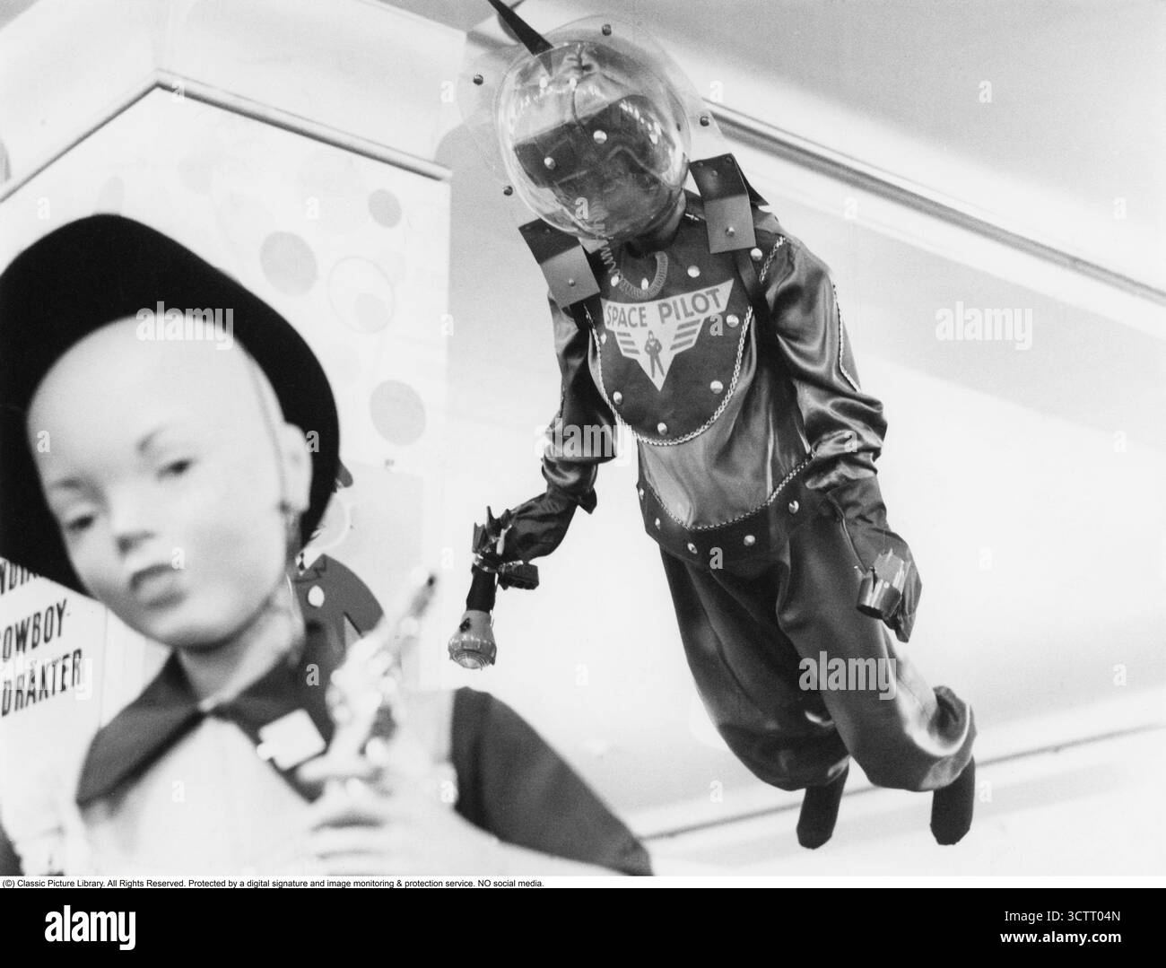 Toys in the 1950s. Interior from a toy store where an action figure ...