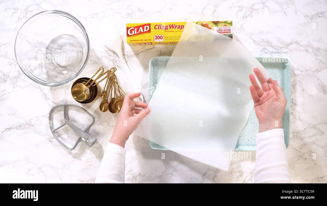 Placing Parchment Sheet in Baking Tray Stock Photo - Alamy