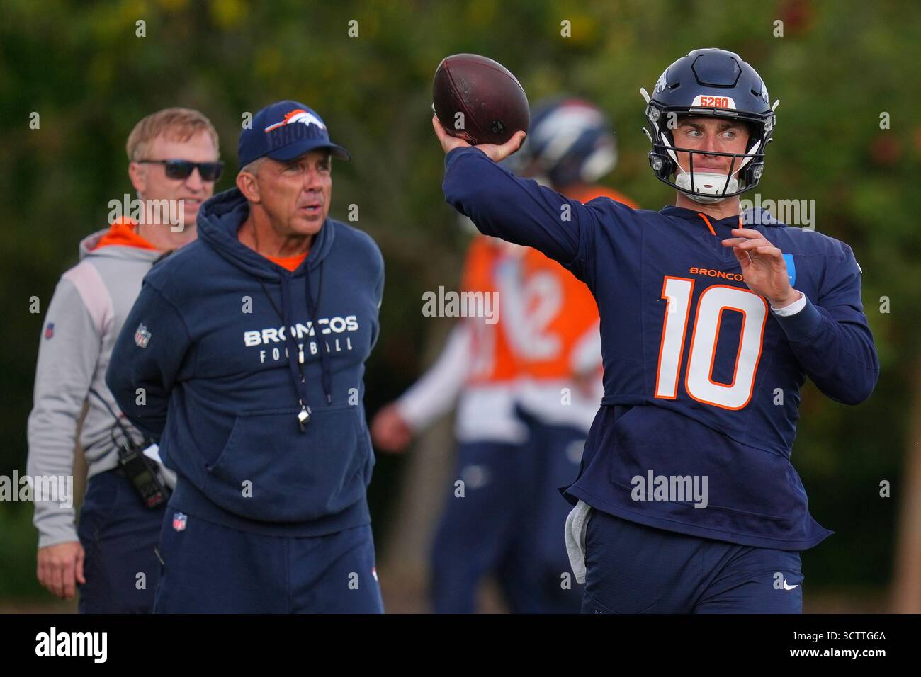 Denver Broncos head coach Sean Payton, left, watches as Denver Broncos ...