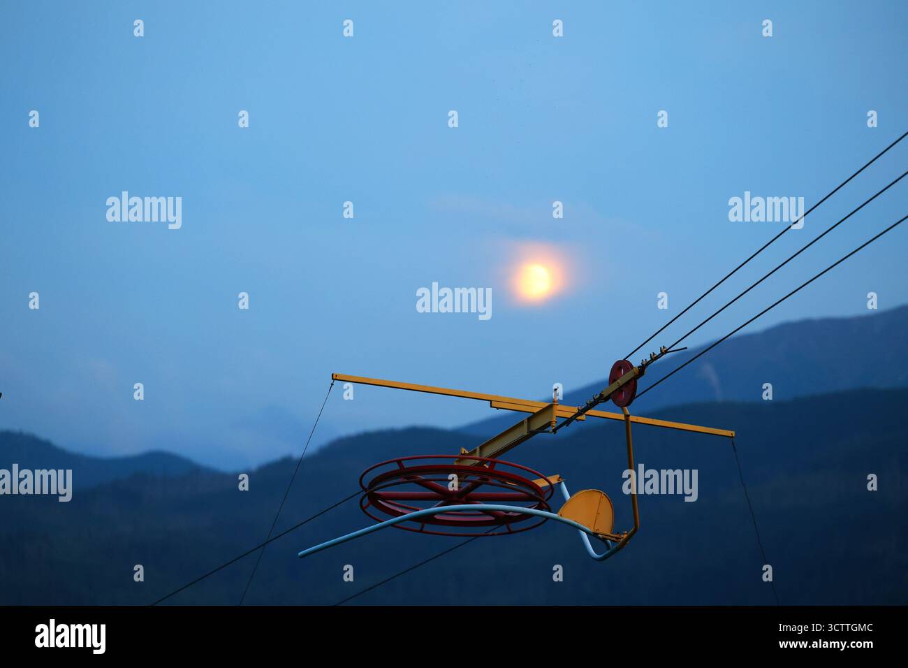 Setting sun over ski lift hi-res stock photography and images - Alamy
