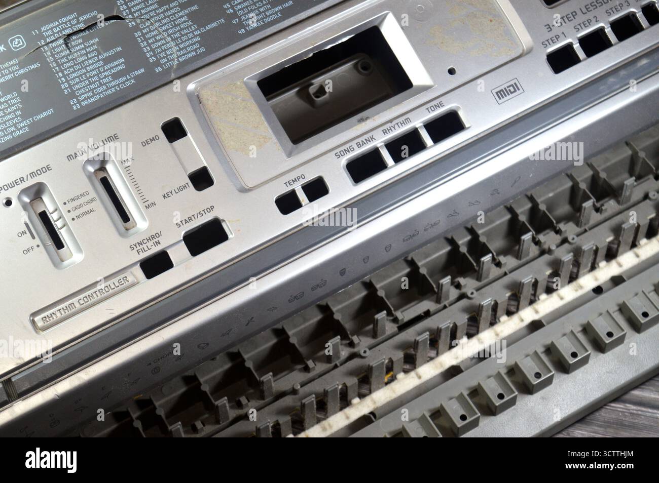 Cairo, Egypt, October 7 2025: Broken electronic musical keyboard ...