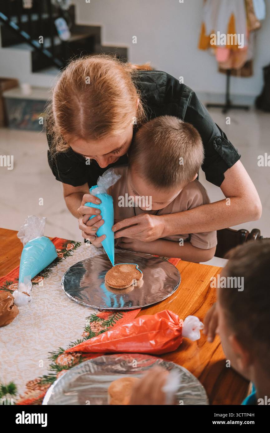 Female pastry chef teaches children hi-res stock photography and images ...