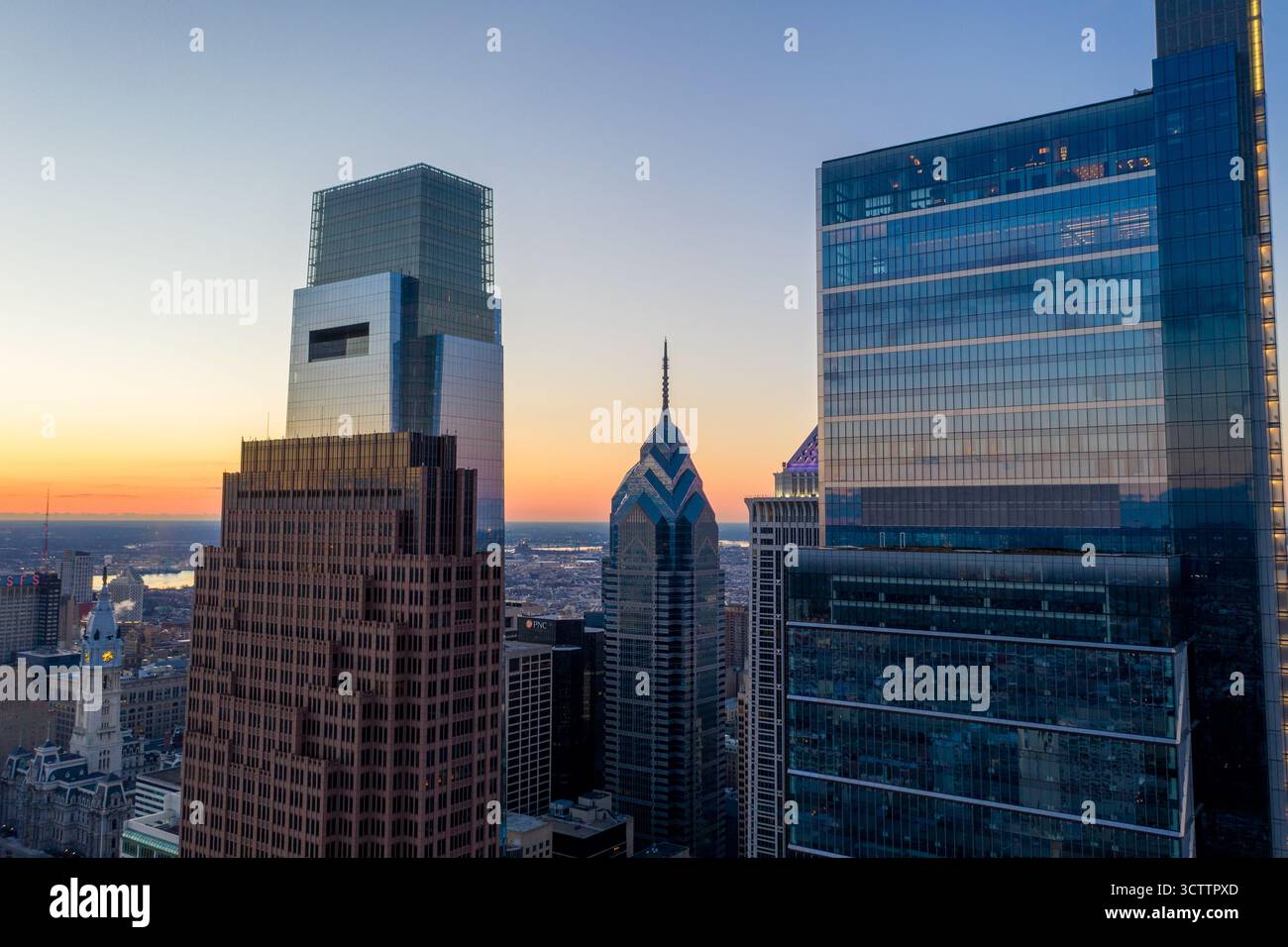Aerial view of skyscrapers piercing the twilight sky, including the ...
