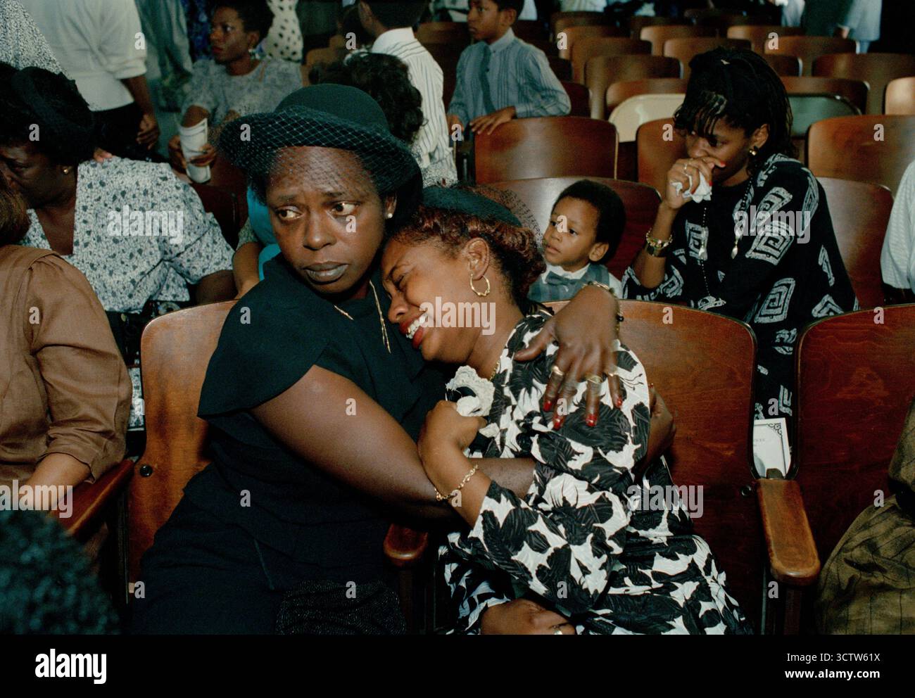 Mourners at the funeral of Clement Anthony Lloyd are overcome with ...