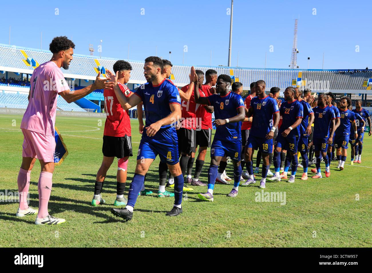 Cape Verde, right, players greet Libyan players before their World Cup ...