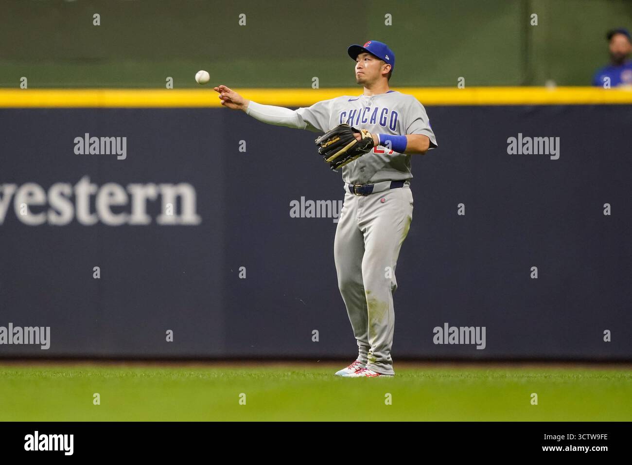 Chicago Cubs right fielder Seiya Suzuki throws the ball to the infield ...