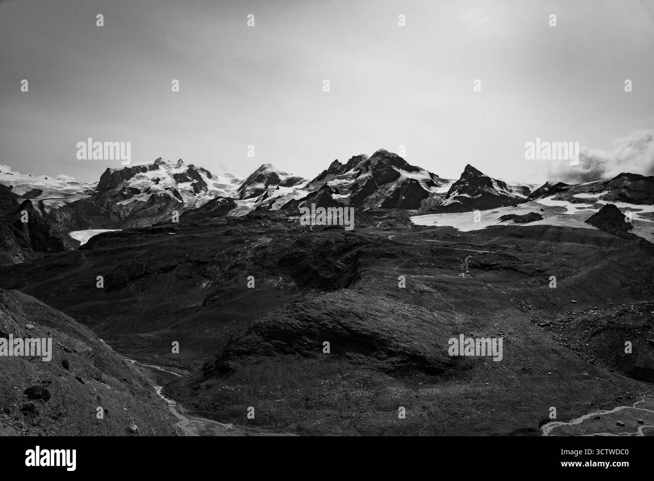 Dramatic snow covered alps Black and White Stock Photos & Images - Alamy