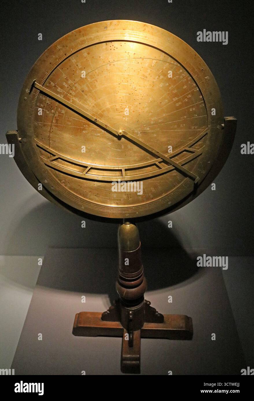 A photograph of a bronze astrolabe (planisphere), an intricate ...