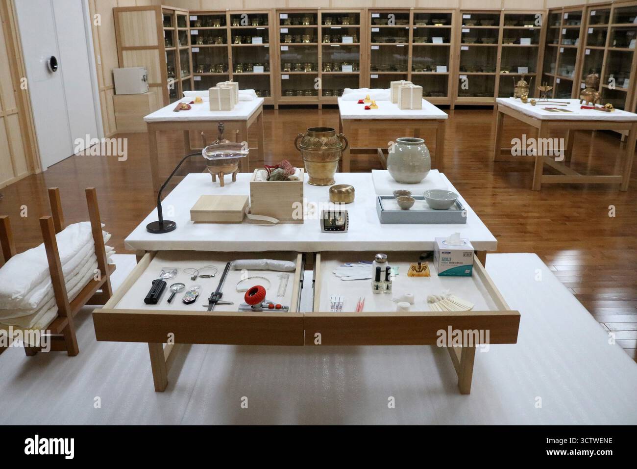 A photograph showing the conservation of precious heritage objects at ...
