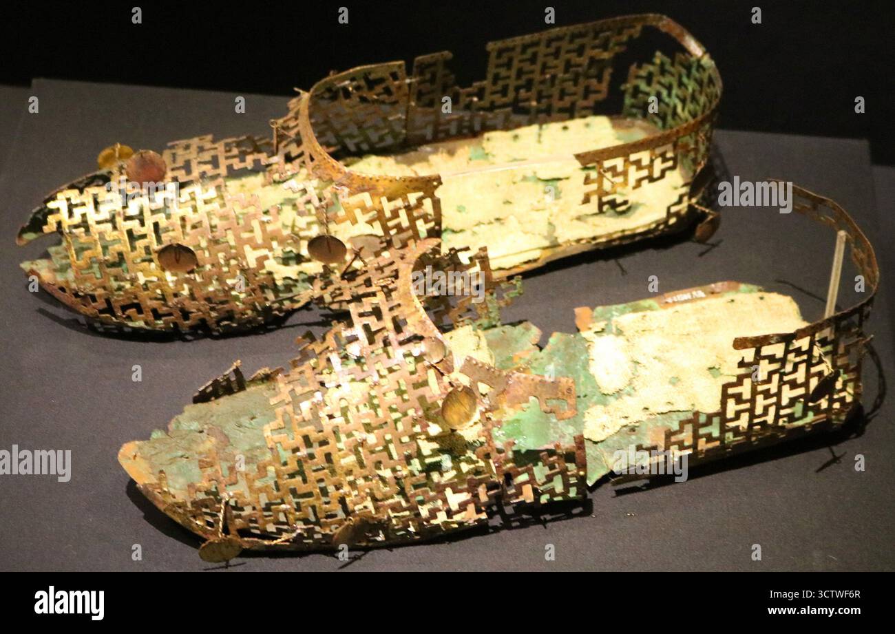 A photograph of Silla-era gilt-bronze shoes discovered in the ...