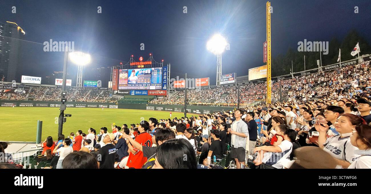 A photograph of the Lotte Giants playing at the Sajik Baseball Stadium ...