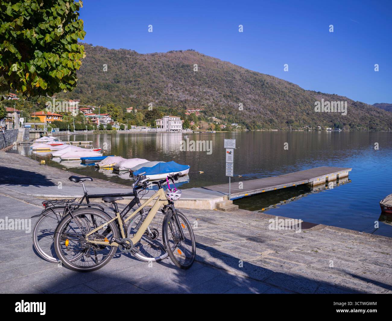 Mergozzo, Piedmont, Italy - October 6, 2025: Lake Mergozzo: bicycles on ...