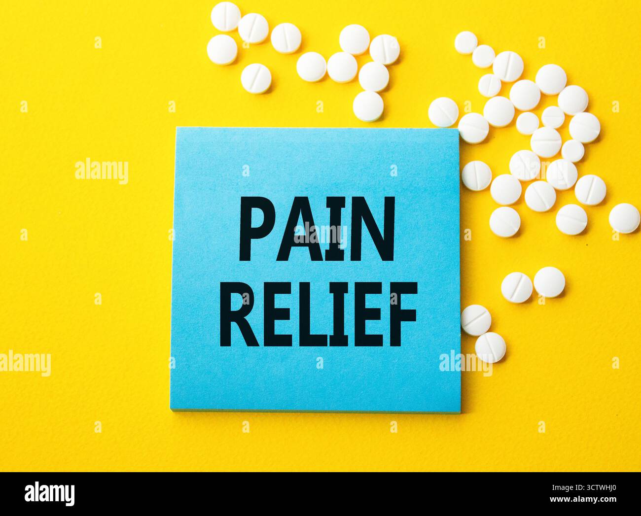 Pain Relief symbol. Concept word Pain Relief on blue note. Beautiful ...