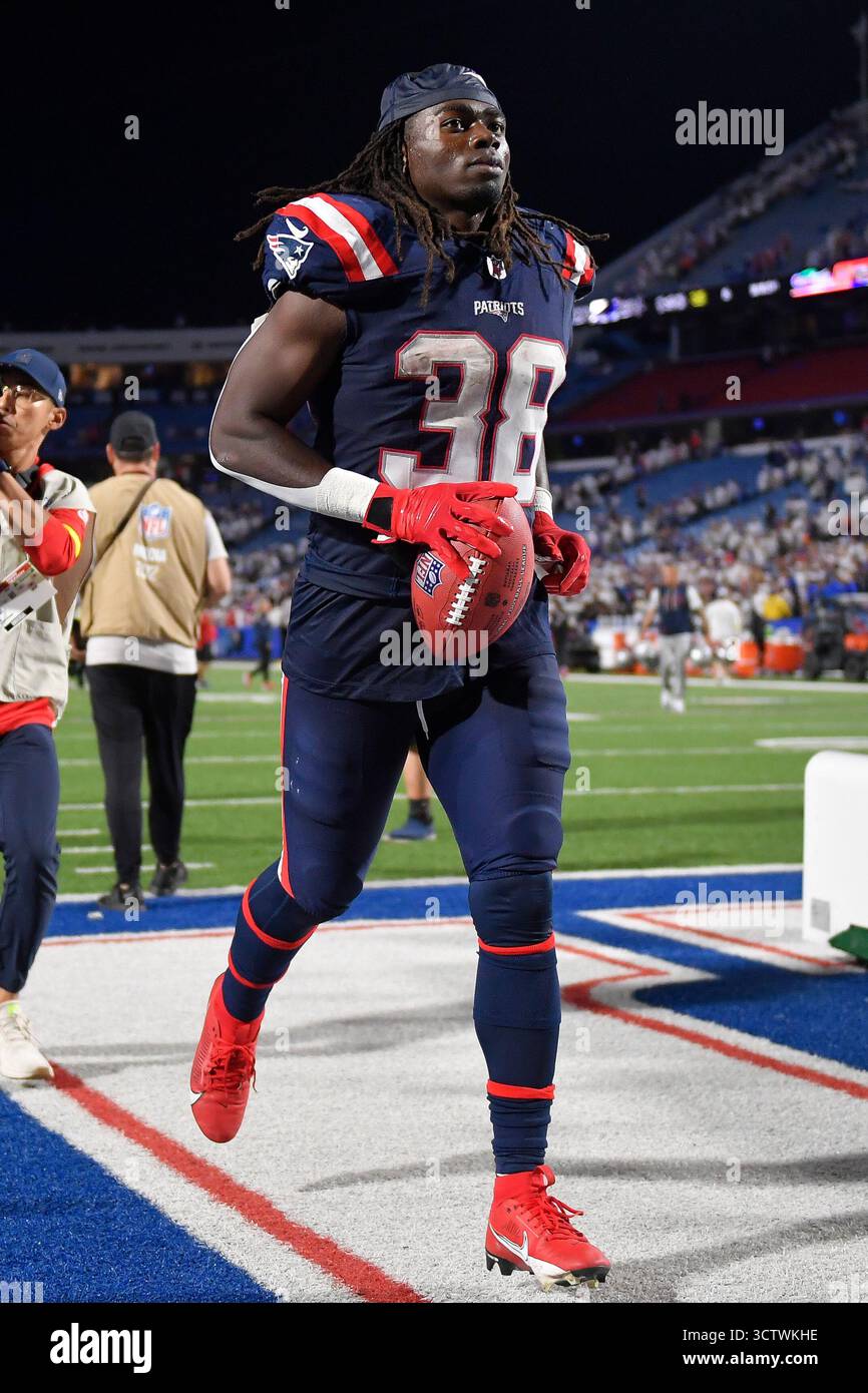 New England Patriots running back Rhamondre Stevenson (38) runs off the ...