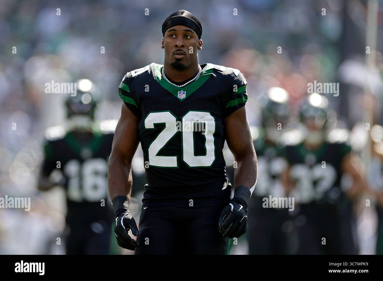 New York Jets running back Breece Hall (20) runs before an NFL football ...