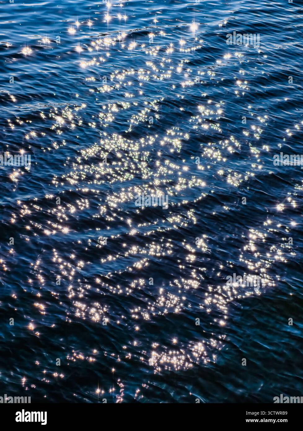 Sparkling shimmering blue particles hi-res stock photography and images ...