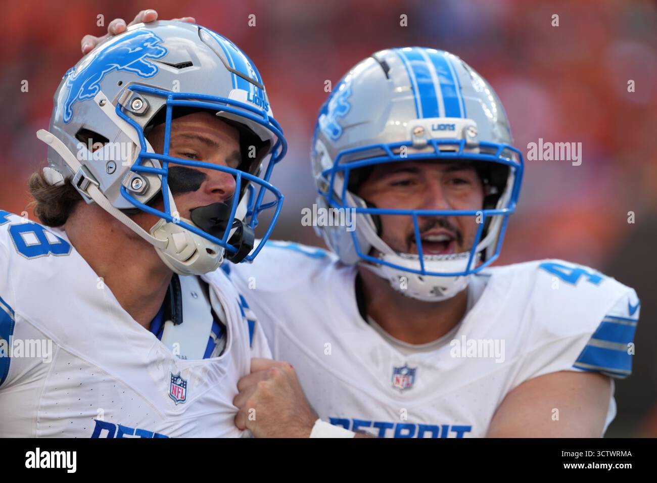 Detroit Lions tight end Zach Horton (40), right, congratulates tight ...