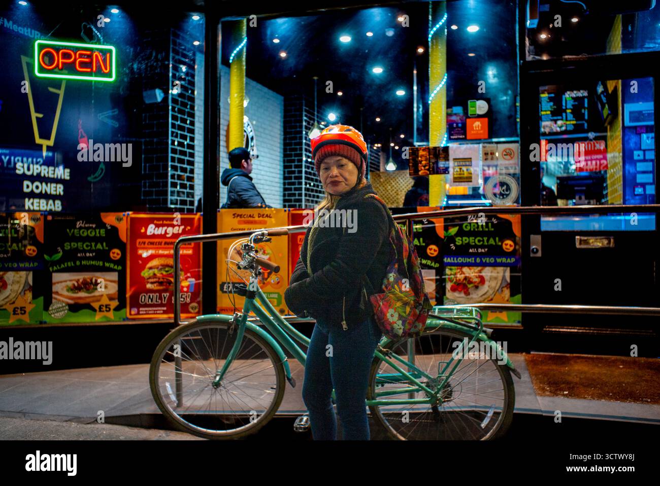 Woollen hat under bike helmet hi-res stock photography and images - Alamy