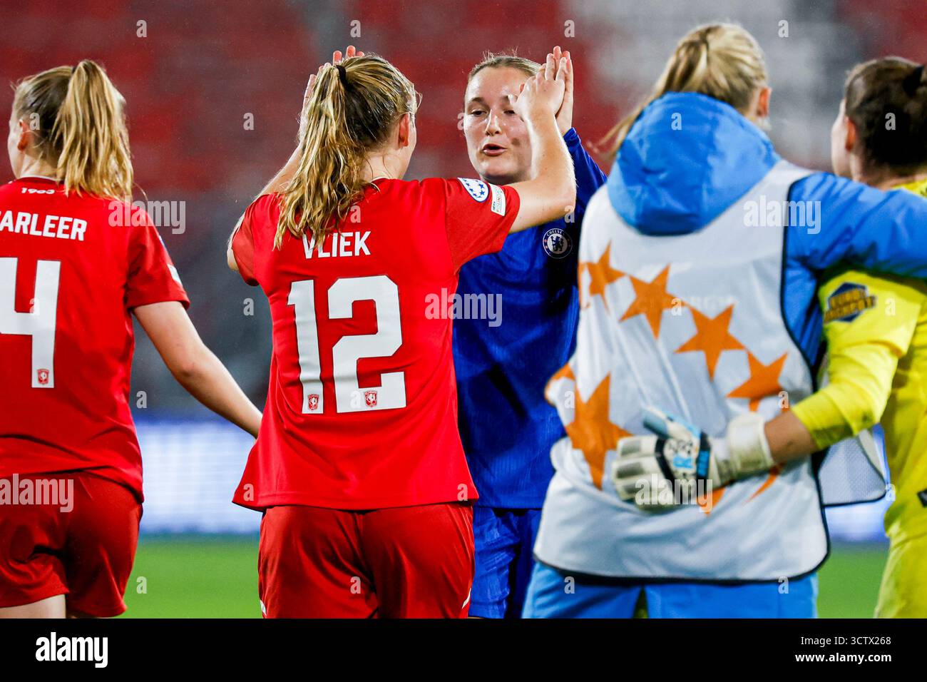 Wieke Kaptein of Chelsea FC and Leonie Vliek of FC Twente looks on ...