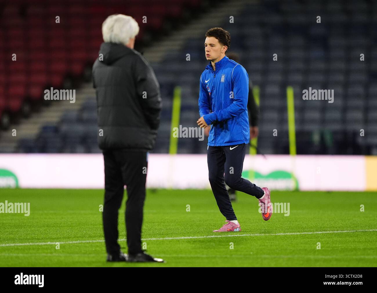 Greece's Konstantinos Karetsas (right) with manager Ivan Jovanovic ...