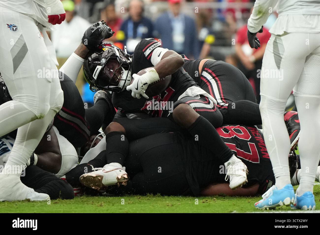 Arizona Cardinals running back Michael Carter (22) scores a touchdown ...