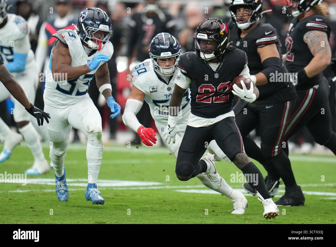 Arizona Cardinals running back Michael Carter (22) runs the ball during ...