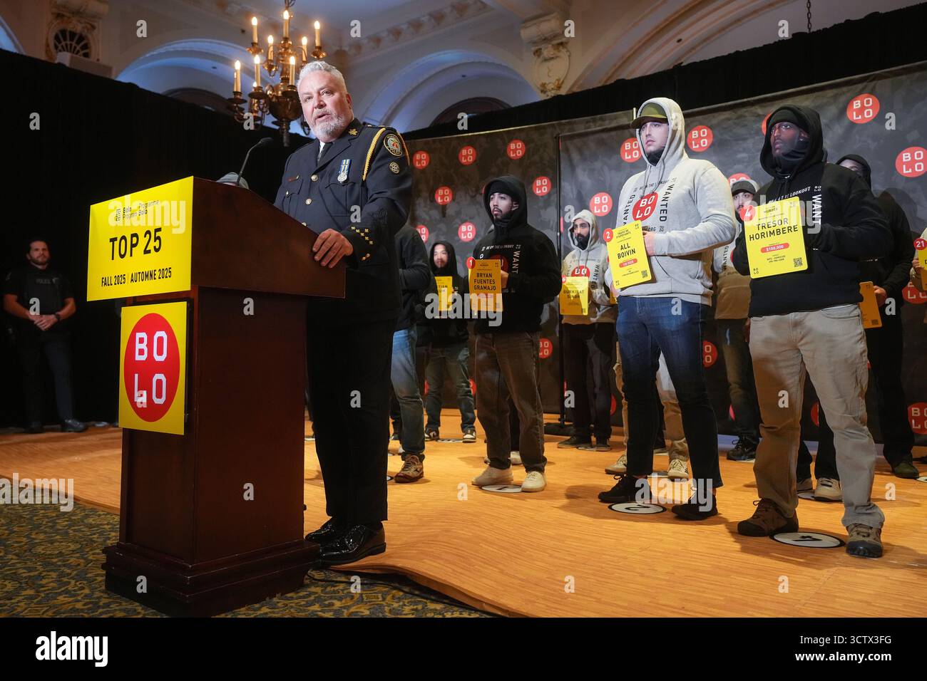 Toronto Police Supt. Joe Matthews speaks as police officers acting as ...