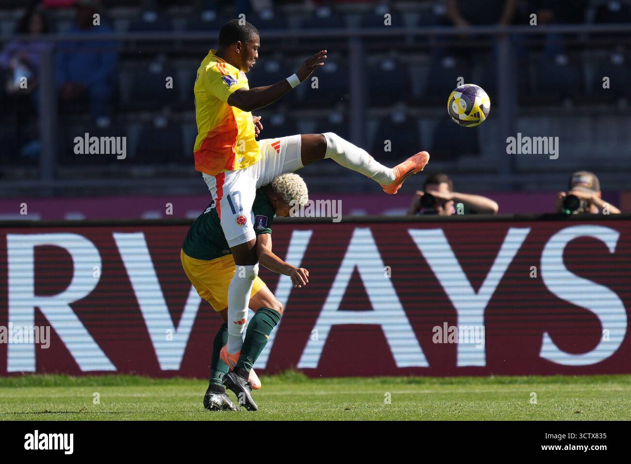 Colombia's Juan Arizala, top, and South Africa's Shakeel April fight ...