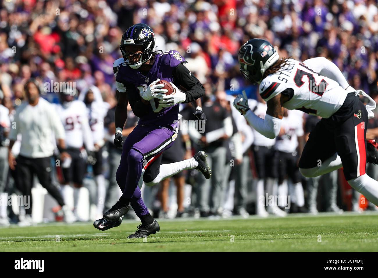Baltimore Ravens wide receiver Deandre Hopkins runs with the ball after ...