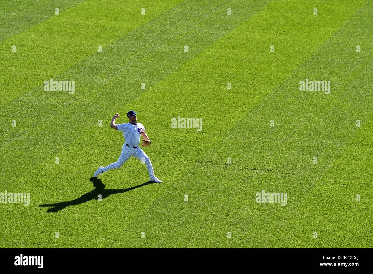 Chicago Cubs' Jameson Taillon warms up before Game 3 of baseball's ...