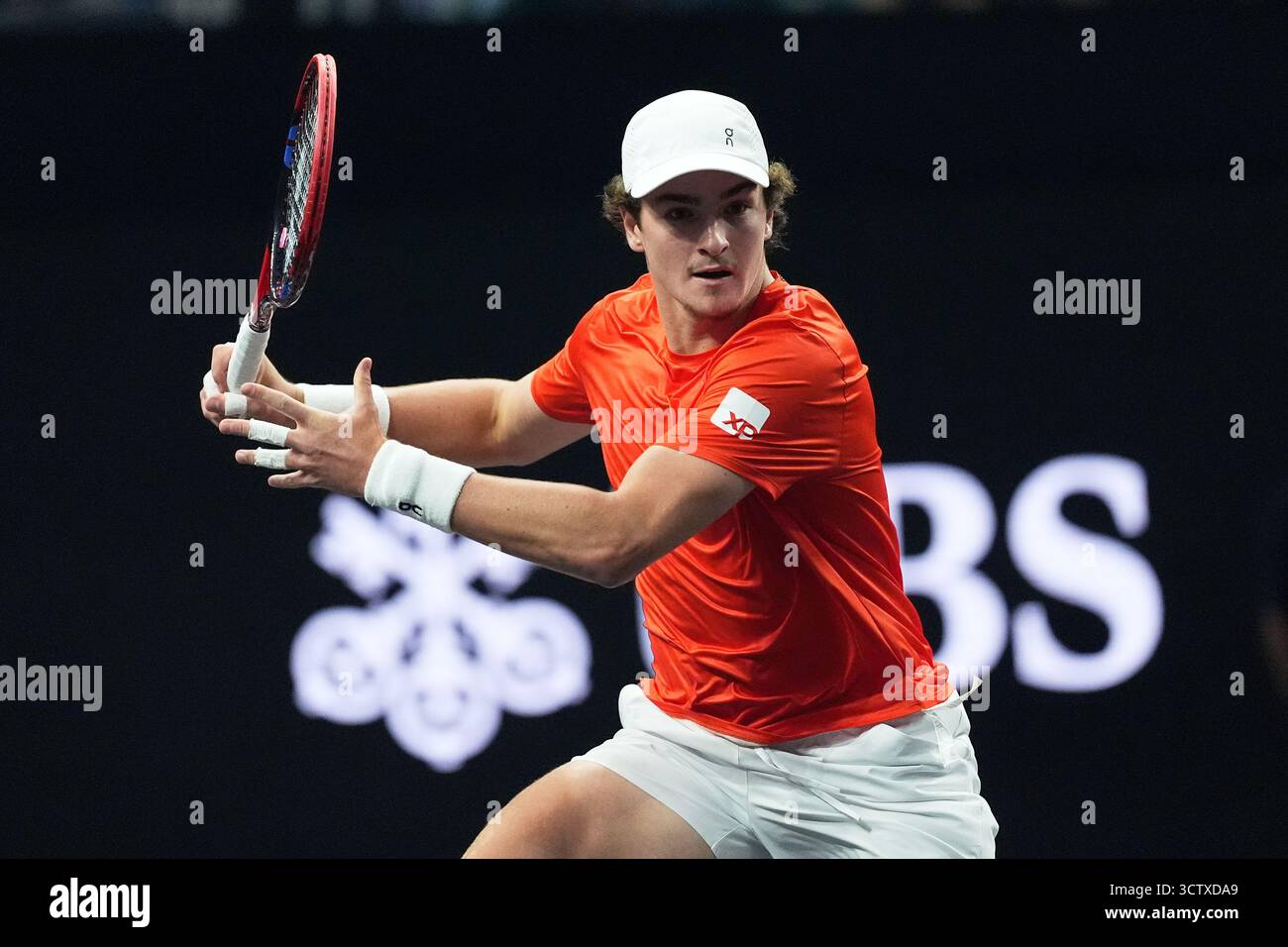 Team World's João Fonseca, of Brazil, returns a shot against Team ...