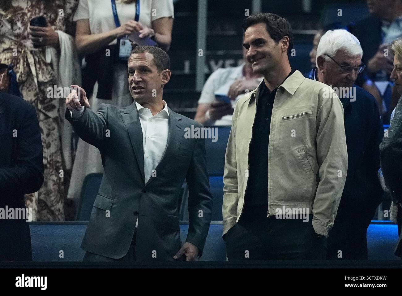 San Francisco Mayor Daniel Lurie, left, gestures next to Roger Federer ...