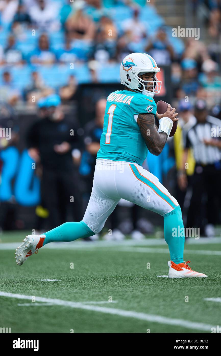 Miami Dolphins quarterback Tua Tagovailoa (1) drops back to pass during an NFL football game ...