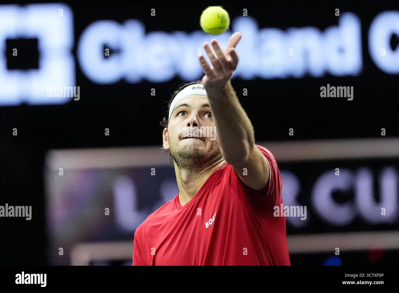 Team World's Taylor Fritz, of the United States, serves against Team ...