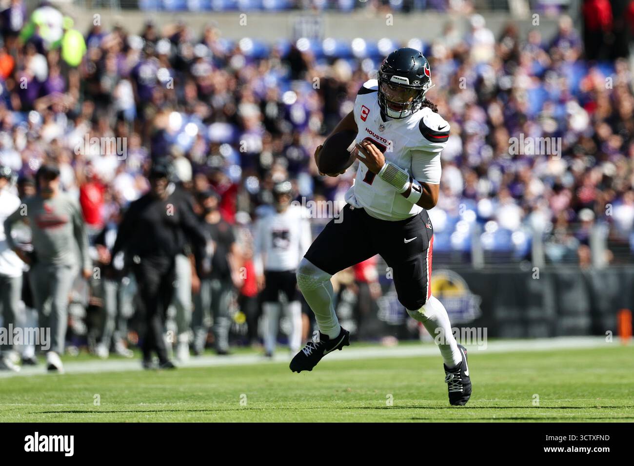 Houston Texans quarterback C.J. Stroud runs the ball during the first ...