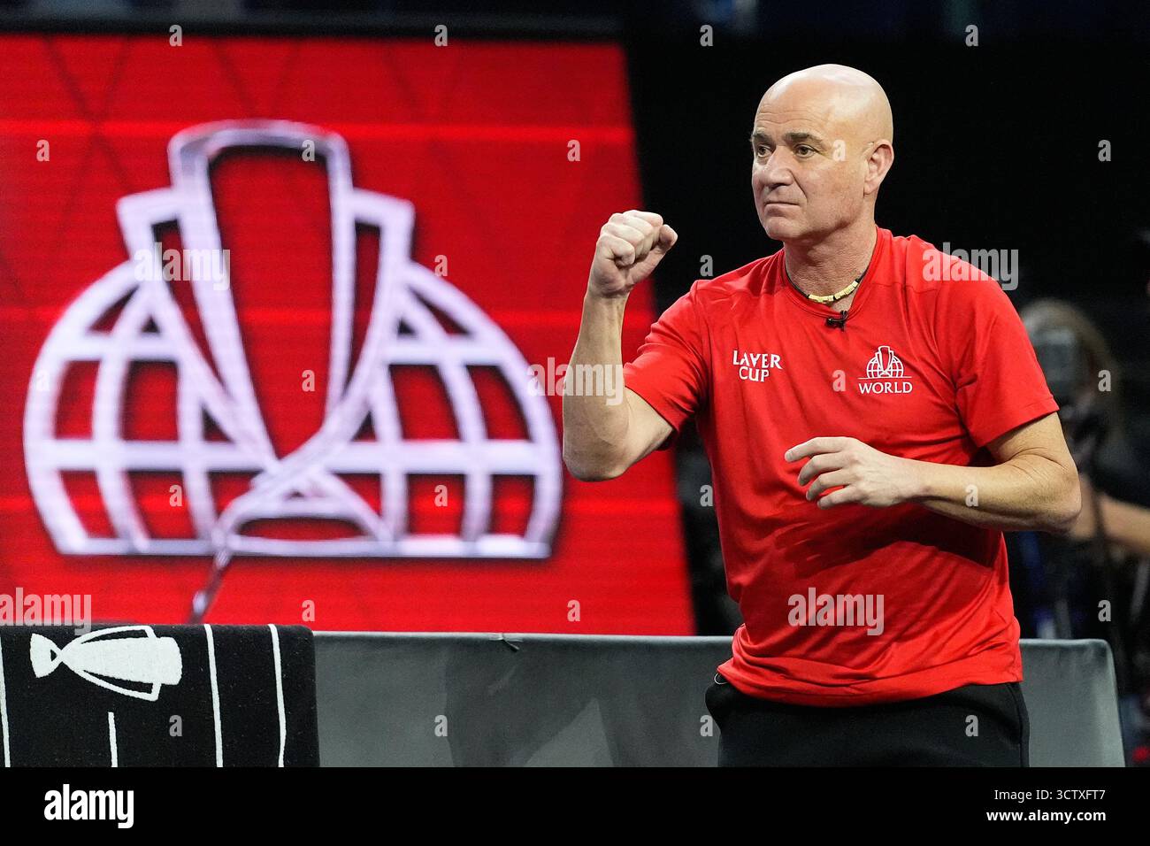 Team World captain Andre Agassi reacts during matches on the third day ...