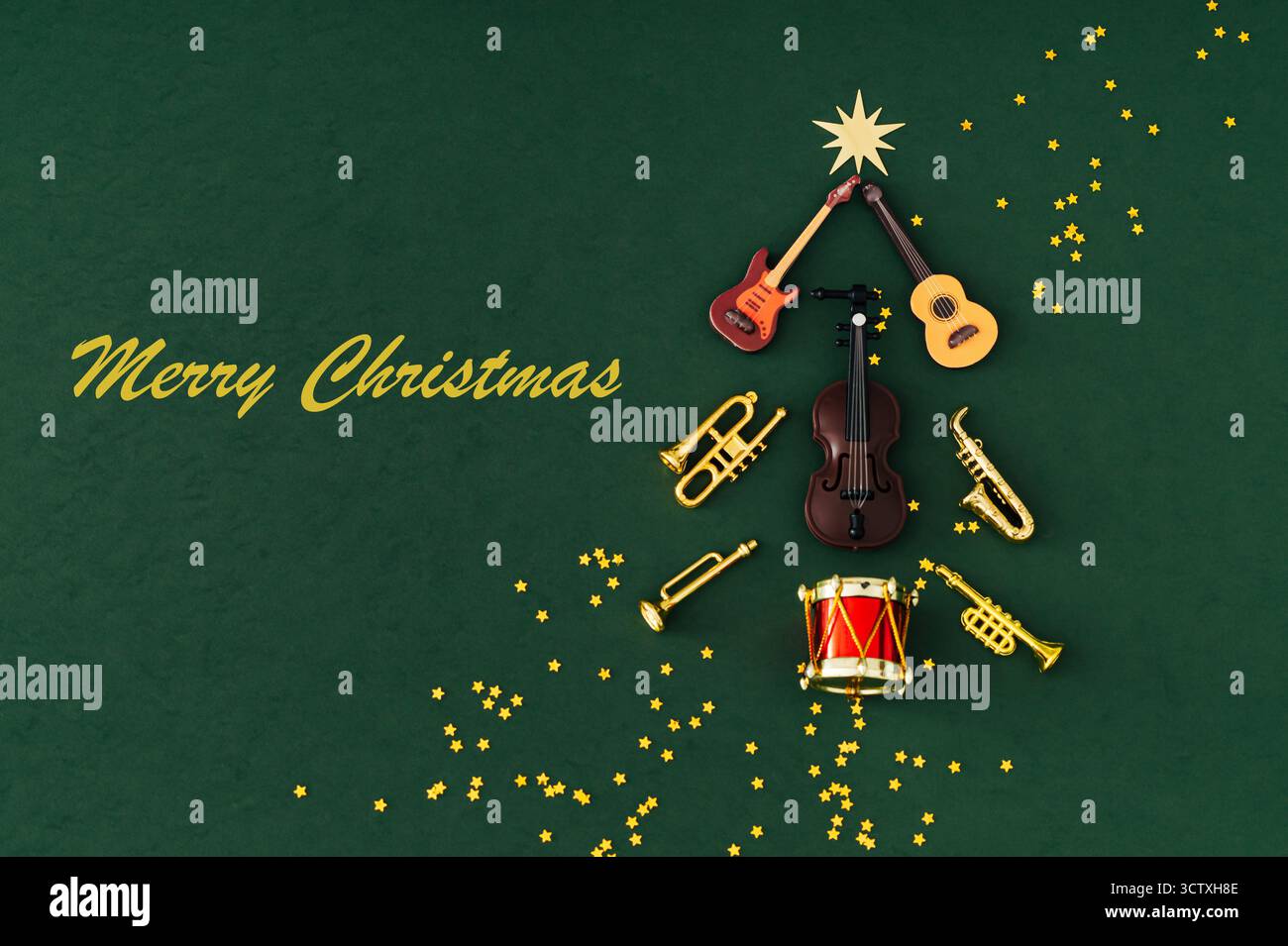 Xmas tree made of musical instruments on green background. Minimal ...
