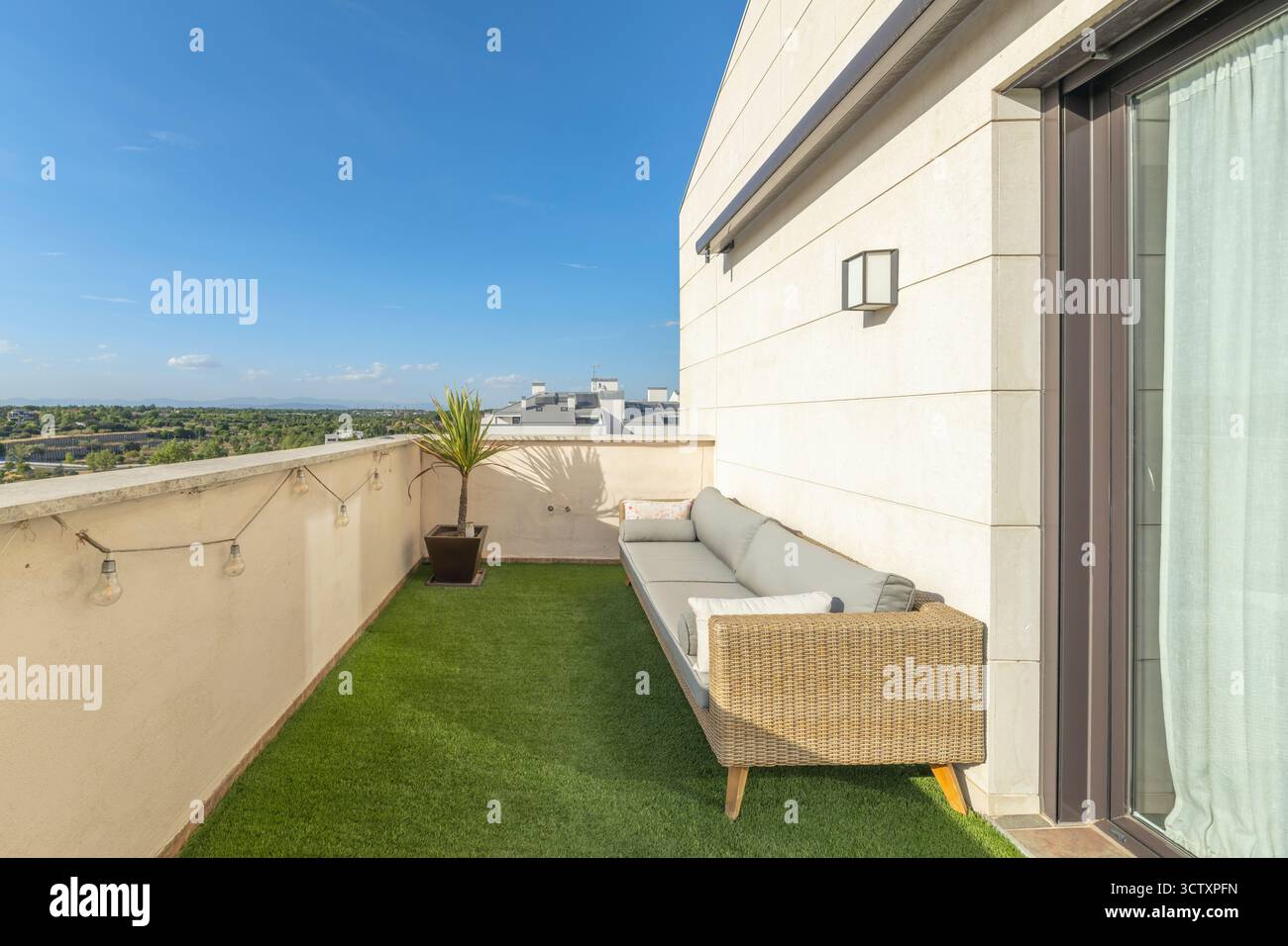Outdoor space with English lawn, rockery, and trimmed hedges that ...
