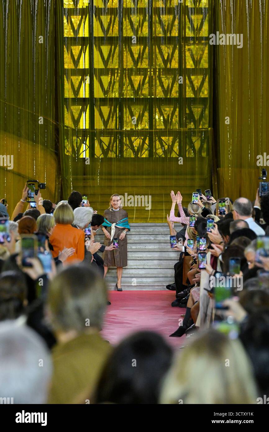 Designer Miuccia Prada is seen on the catwalk at the Miu Miu fashion ...