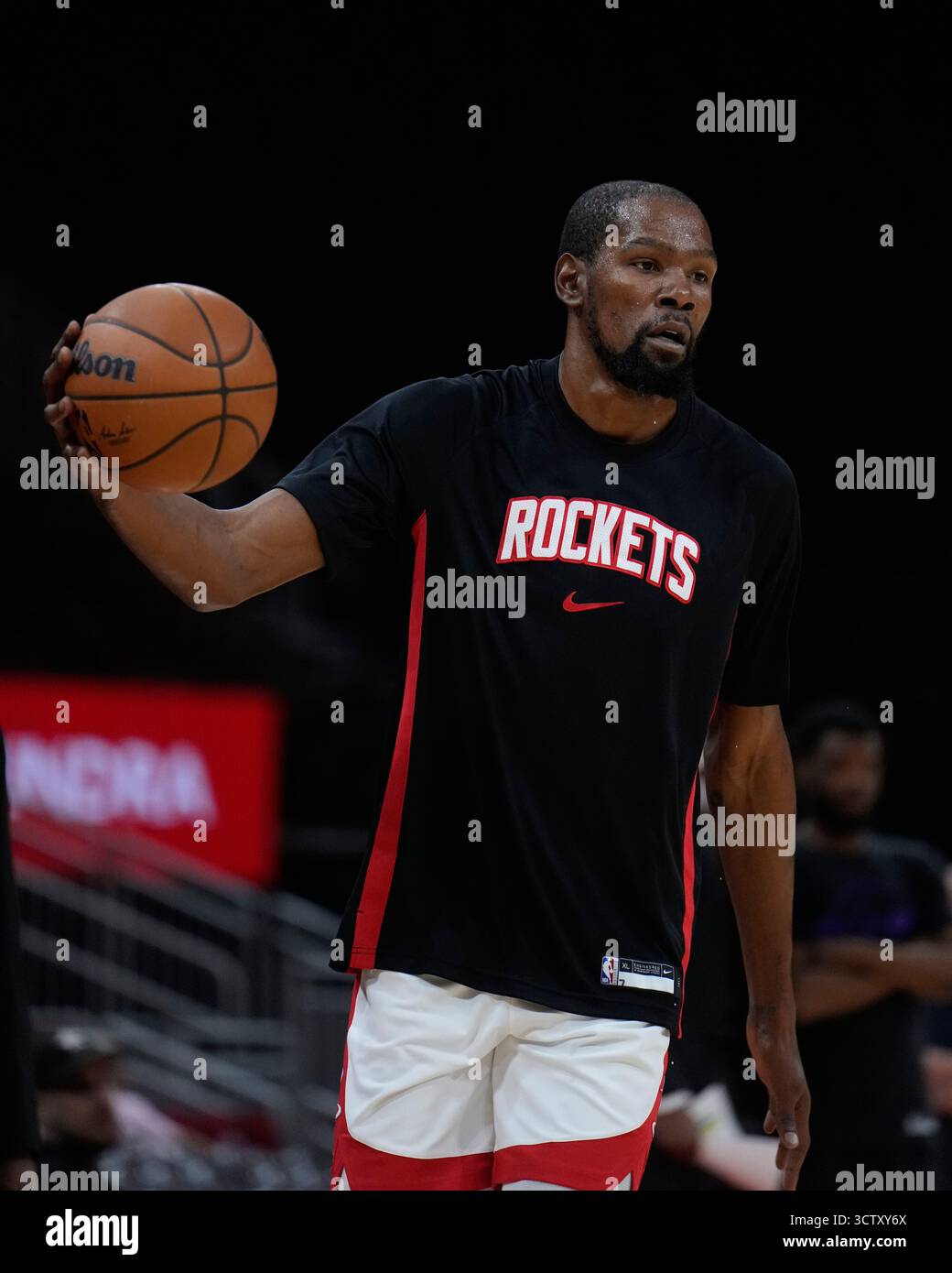 Houston Rockets forward Kevin Durant warms up before an NBA basketball ...