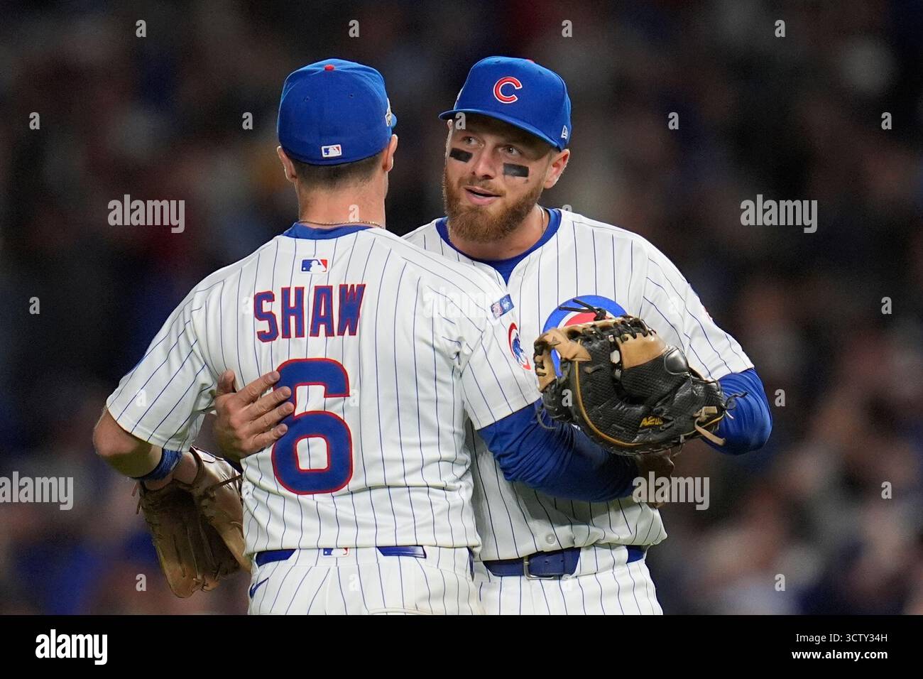 Chicago Cubs' Matt Shaw and Michael Busch celebrate after Game 3 of ...