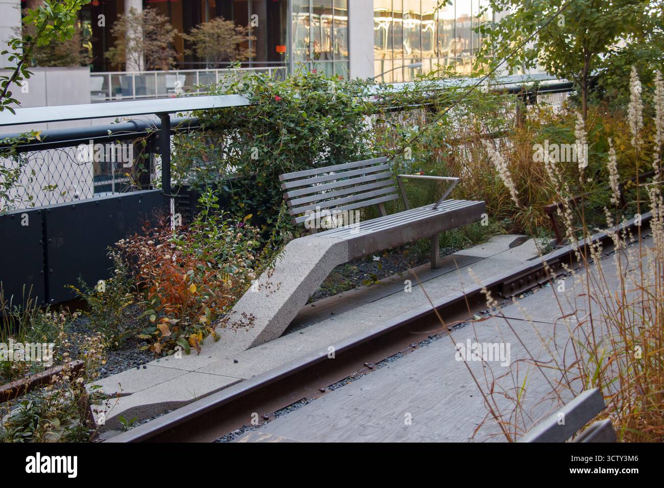 Modern Bench on the elevated High Line linear park in Chelsea ...
