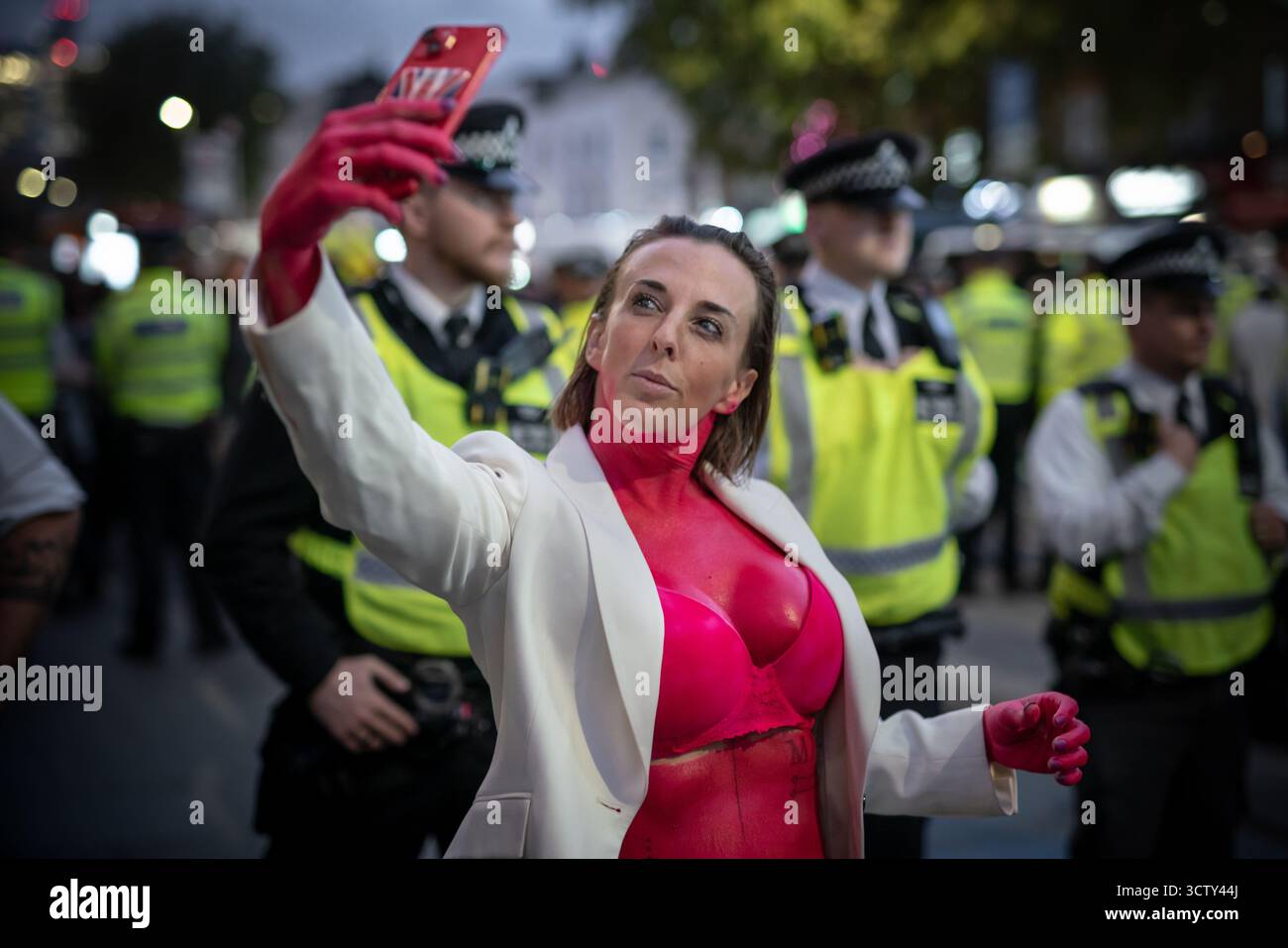 London, UK. 8th October 2025. Sarah White of the 'Pink Ladies' protest ...